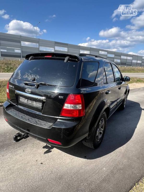 Black Kia Sorento 2009 in Marijampole, with an engine capacity of 2.50 L and mileage of 217 thousand km for 2950 €, photo 3 on AUTOMOTO.COM.LV