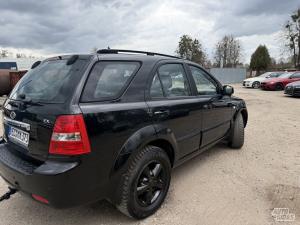 Black Kia Sorento 2009 in Prienai, with an engine capacity of 2.50 L and mileage of 246 thousand km for 3650 €, photo 9 on AUTOMOTO.COM.LV