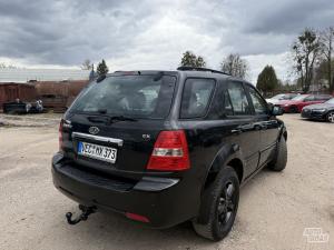 Black Kia Sorento 2009 in Prienai, with an engine capacity of 2.50 L and mileage of 246 thousand km for 3650 €, photo 10 on AUTOMOTO.COM.LV