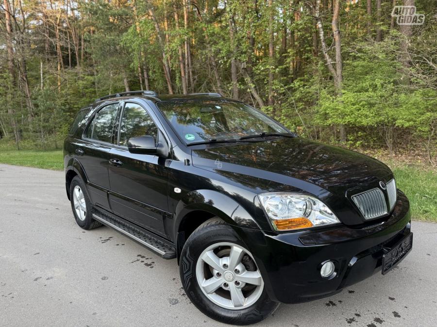 Black Kia Sorento 2009 in Prienai, with an engine capacity of 2.50 L and mileage of 258 thousand km for 3700 €, photo 7 on AUTOMOTO.COM.LV