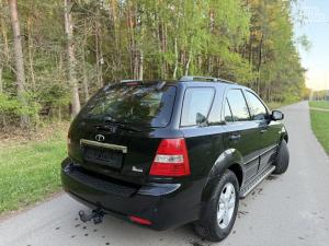 Black Kia Sorento 2009 in Prienai, with an engine capacity of 2.50 L and mileage of 258 thousand km for 3700 €, photo 8 on AUTOMOTO.COM.LV