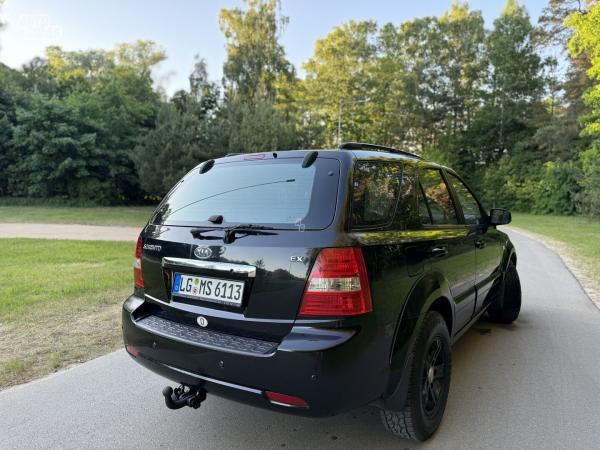 Black Kia Sorento 2009 in Prienai, with an engine capacity of 2.50 L and mileage of 215 thousand km for 3600 €, photo 9 on AUTOMOTO.COM.LV