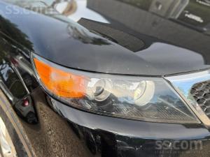 Black Kia Sorento 2009 in Riga, with an engine capacity of 2.20 L and mileage of 315 thousand km for 5500 €, photo 13 on AUTOMOTO.COM.LV