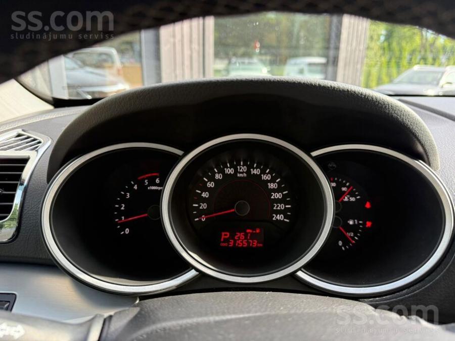 Black Kia Sorento 2009 in Riga, with an engine capacity of 2.20 L and mileage of 315 thousand km for 5500 €, photo 14 on AUTOMOTO.COM.LV