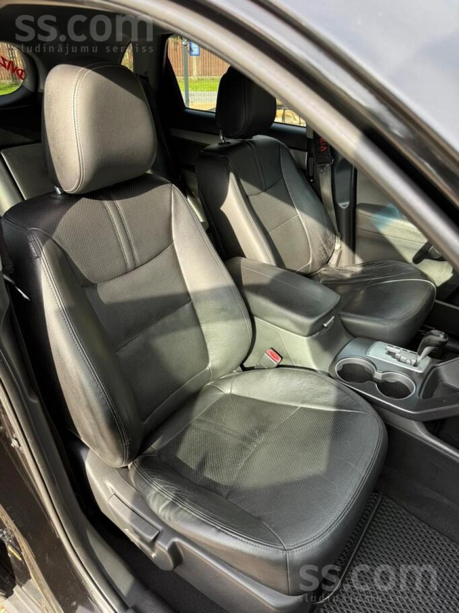 Black Kia Sorento 2009 in Riga, with an engine capacity of 2.20 L and mileage of 315 thousand km for 5500 €, photo 18 on AUTOMOTO.COM.LV