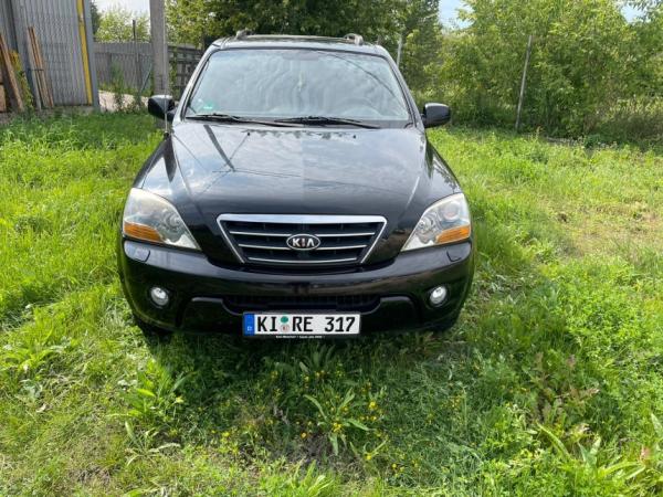 Black Kia Sorento 2009 in Riga, with an engine capacity of 2.50 L and mileage of 0 thousand km for 5700 €, photo 2 on AUTOMOTO.COM.LV
