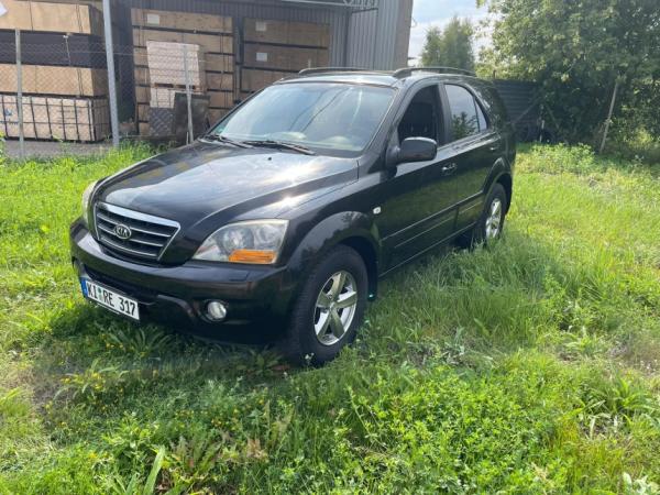 Black Kia Sorento 2009 in Riga, with an engine capacity of 2.50 L and mileage of 0 thousand km for 5700 €, photo 4 on AUTOMOTO.COM.LV