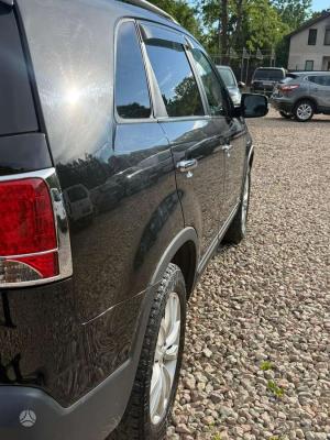 Melns Kia Sorento 2009 Rīga, ar dzinēja tilpumu 2.20 L un nobraukumu 315 tūkst. km par 4995 €, foto 7 vietnē AUTOMOTO.COM.LV