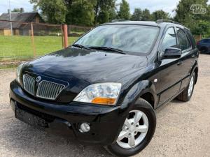 Black Kia Sorento 2009 in Prienai, with an engine capacity of 2.50 L and mileage of 225 thousand km for 3700 €, photo  on AUTOMOTO.COM.LV