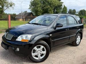 Black Kia Sorento 2009 in Prienai, with an engine capacity of 2.50 L and mileage of 225 thousand km for 3700 €, photo 13 on AUTOMOTO.COM.LV