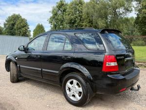 Black Kia Sorento 2009 in Prienai, with an engine capacity of 2.50 L and mileage of 225 thousand km for 3700 €, photo 16 on AUTOMOTO.COM.LV