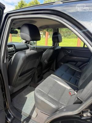 Black Kia Sorento 2009 in Prienai, with an engine capacity of 2.50 L and mileage of 225 thousand km for 3700 €, photo 21 on AUTOMOTO.COM.LV