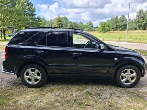 Black Kia Sorento 2009 in Prienai, with an engine capacity of 2.50 L and mileage of 223 thousand km for 3700 €, photo 18 on AUTOMOTO.COM.LV