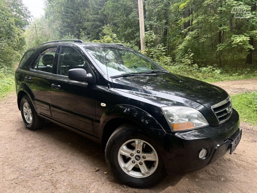 Black Kia Sorento 2009 in Prienai, with an engine capacity of 2.50 L and mileage of 249 thousand km for 2650 €, photo 9 on AUTOMOTO.COM.LV