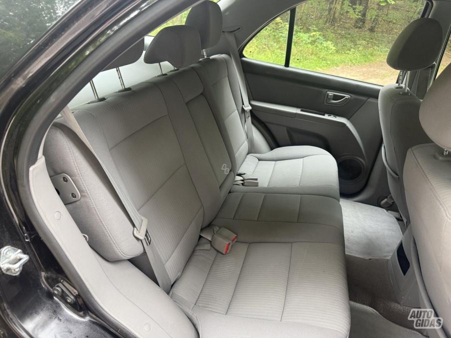 Black Kia Sorento 2009 in Prienai, with an engine capacity of 2.50 L and mileage of 249 thousand km for 2650 €, photo 13 on AUTOMOTO.COM.LV