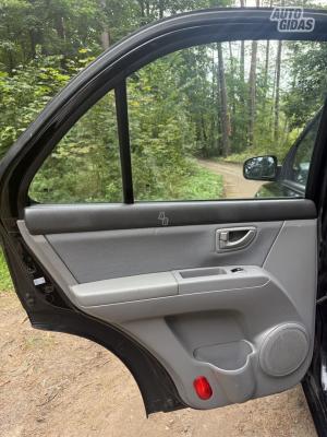 Black Kia Sorento 2009 in Prienai, with an engine capacity of 2.50 L and mileage of 249 thousand km for 2650 €, photo 20 on AUTOMOTO.COM.LV