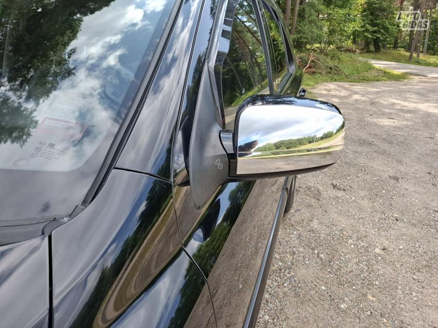 Black Kia Sorento 2009 in Prienai, with an engine capacity of 2.50 L and mileage of 223 thousand km for 3700 €, photo 14 on AUTOMOTO.COM.LV