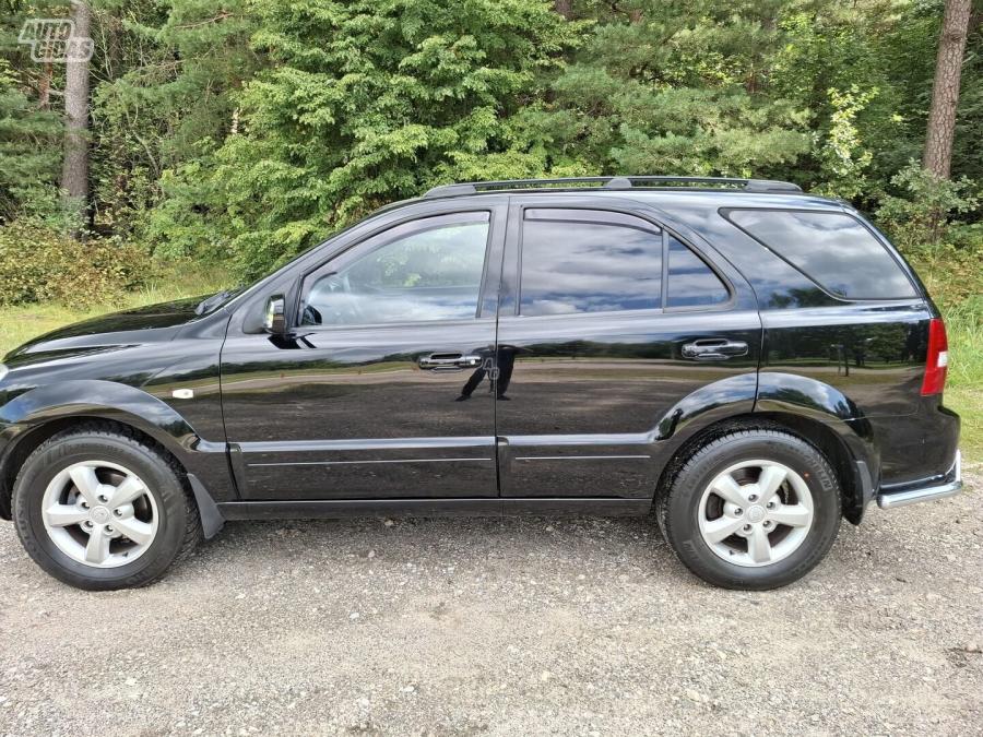 Black Kia Sorento 2009 in Prienai, with an engine capacity of 2.50 L and mileage of 223 thousand km for 3700 €, photo 21 on AUTOMOTO.COM.LV
