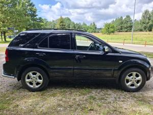 Black Kia Sorento 2009 in Prienai, with an engine capacity of 2.50 L and mileage of 223 thousand km for 3700 €, photo 23 on AUTOMOTO.COM.LV