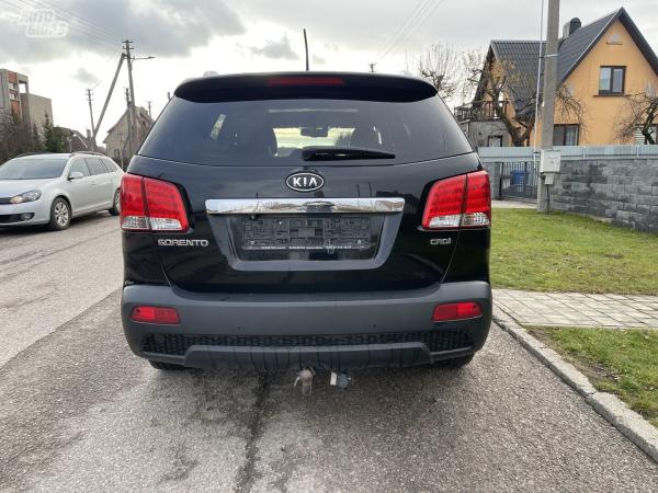 Black Kia Sorento 2011 in Marijampole, with an engine capacity of 2.20 L and mileage of 234 thousand km for 7700 €, photo 8 on AUTOMOTO.COM.LV