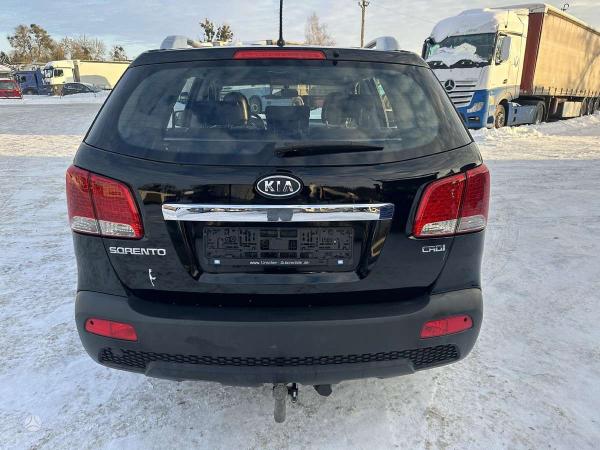 Black Kia Sorento 2011 in Prienai, with an engine capacity of 2.20 L and mileage of 263 thousand km for 6500 €, photo 6 on AUTOMOTO.COM.LV