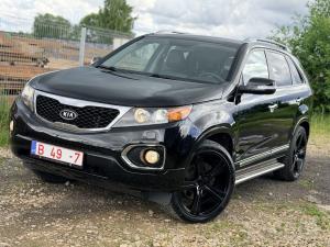 Melns Kia Sorento 2011 Rīga, ar dzinēja tilpumu 2.20 L un nobraukumu 197 tūkst. km par 8995 €, foto 24 vietnē AUTOMOTO.COM.LV