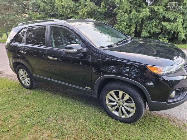 Melns Kia Sorento 2011 Mažeikiai, ar dzinēja tilpumu 2.20 L un nobraukumu 257 tūkst. km par 5450 €, foto 6 vietnē AUTOMOTO.COM.LV