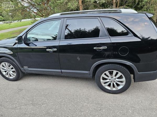 Melns Kia Sorento 2011 Mažeikiai, ar dzinēja tilpumu 2.20 L un nobraukumu 257 tūkst. km par 5450 €, foto 10 vietnē AUTOMOTO.COM.LV