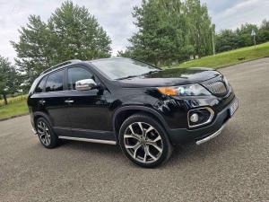 Black Kia Sorento 2011 in Utena, with an engine capacity of 2.20 L and mileage of 263 thousand km for 5950 €, photo 8 on AUTOMOTO.COM.LV