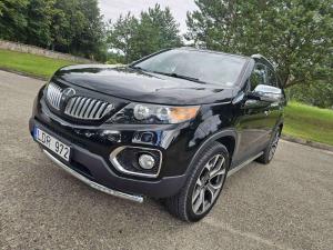 Black Kia Sorento 2011 in Utena, with an engine capacity of 2.20 L and mileage of 267 thousand km for 5950 €, photo  on AUTOMOTO.COM.LV