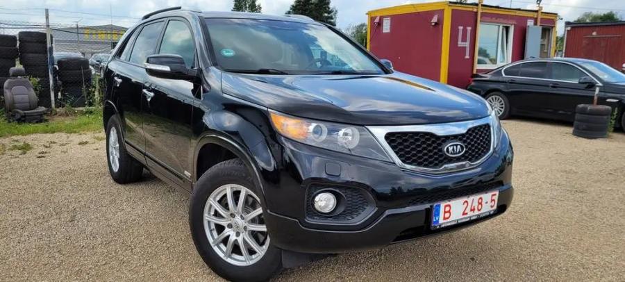 Black Kia Sorento 2012 in Riga, with an engine capacity of 2.20 L and mileage of 231 thousand km for 9200 €, photo 4 on AUTOMOTO.COM.LV