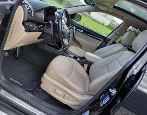 Black Kia Sorento 2013 in Vilkaviskis, with an engine capacity of 2.20 L and mileage of 176 thousand km for 9800 €, photo 20 on AUTOMOTO.COM.LV