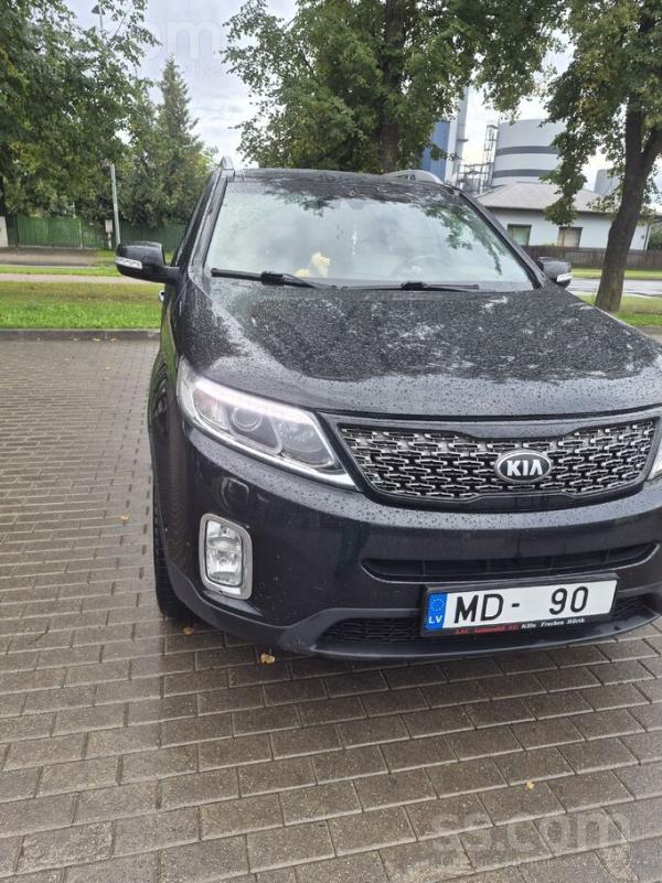 Melns Kia Sorento 2013 Jelgava, ar dzinēja tilpumu 2.20 L un nobraukumu 255 tūkst. km par 10500 €, foto 4 vietnē AUTOMOTO.COM.LV
