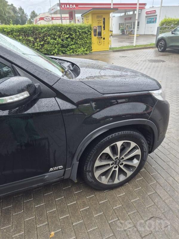 Melns Kia Sorento 2013 Jelgava, ar dzinēja tilpumu 2.20 L un nobraukumu 255 tūkst. km par 10500 €, foto 5 vietnē AUTOMOTO.COM.LV
