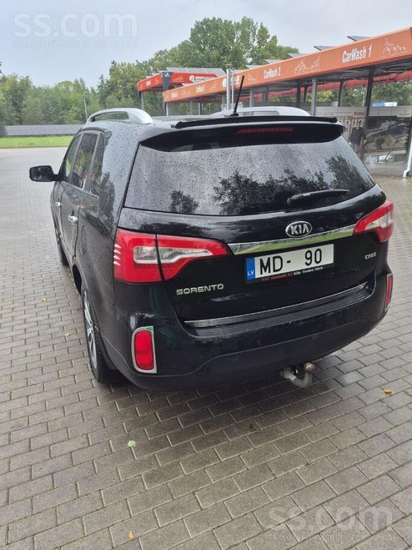 Melns Kia Sorento 2013 Jelgava, ar dzinēja tilpumu 2.20 L un nobraukumu 255 tūkst. km par 10500 €, foto 8 vietnē AUTOMOTO.COM.LV