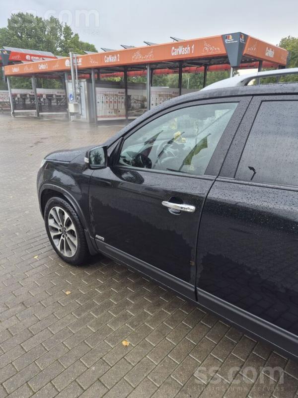 Melns Kia Sorento 2013 Jelgava, ar dzinēja tilpumu 2.20 L un nobraukumu 255 tūkst. km par 10500 €, foto 10 vietnē AUTOMOTO.COM.LV