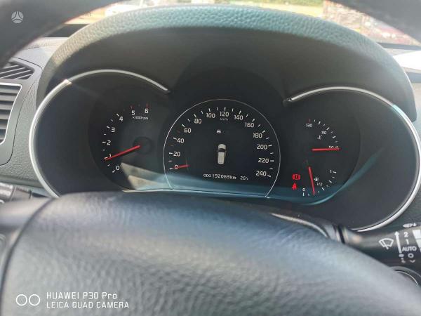 Black Kia Sorento 2014 in Prienai, with an engine capacity of 2.20 L and mileage of 191 thousand km for 9650 €, photo 4 on AUTOMOTO.COM.LV