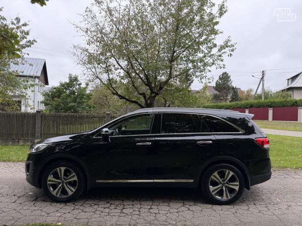 Black Kia Sorento 2015 in Kaunas, with an engine capacity of 2.20 L and mileage of 219 thousand km for 13950 €, photo 6 on AUTOMOTO.COM.LV