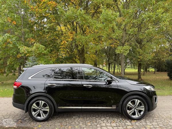 Black Kia Sorento 2015 in Kaunas, with an engine capacity of 2.20 L and mileage of 219 thousand km for 13950 €, photo 7 on AUTOMOTO.COM.LV