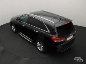 Black Kia Sorento 2016 in Vilnius, with an engine capacity of 2.20 L and mileage of 268 thousand km for 13399 €, photo 13 on AUTOMOTO.COM.LV