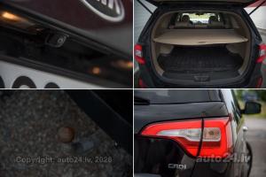 Black Kia Sorento 2012 in Tallinn, with an engine capacity of 2.20 L and mileage of 262 thousand km for 9700 €, photo 12 on AUTOMOTO.COM.LV