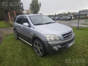 Blue Kia Sorento 2005 in Riga, with an engine capacity of 2.50 L and mileage of 262 thousand km for 2790 €, photo 3 on AUTOMOTO.COM.LV