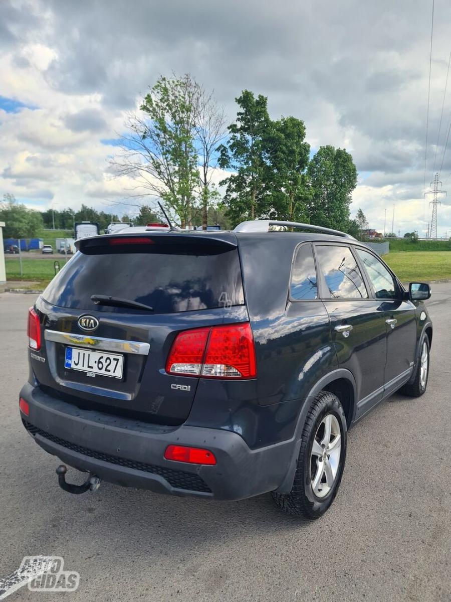 Blue Kia Sorento 2011 in Siauliai, with an engine capacity of 2.20 L and mileage of 320 thousand km for 5200 €, photo 3 on AUTOMOTO.COM.LV