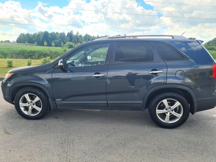Blue Kia Sorento 2011 in Siauliai, with an engine capacity of 2.20 L and mileage of 320 thousand km for 5200 €, photo 6 on AUTOMOTO.COM.LV