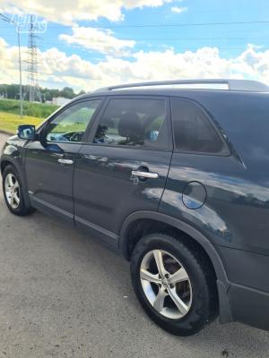 Blue Kia Sorento 2011 in Siauliai, with an engine capacity of 2.20 L and mileage of 320 thousand km for 5200 €, photo 7 on AUTOMOTO.COM.LV