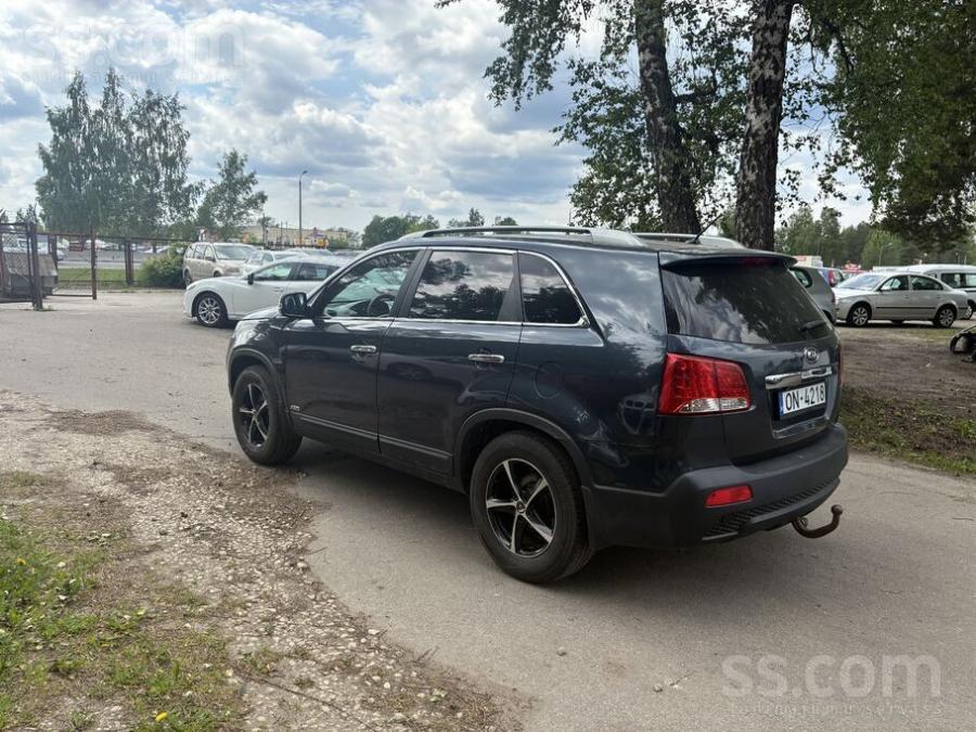 Zils Kia Sorento 2011 Rīga, ar dzinēja tilpumu 2.20 L un nobraukumu 0 tūkst. km par 5990 €, foto 8 vietnē AUTOMOTO.COM.LV