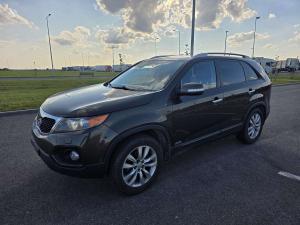 Brown Kia Sorento 2010 in Marijampole, with an engine capacity of 2.20 L and mileage of 265 thousand km for 4400 €, photo 7 on AUTOMOTO.COM.LV