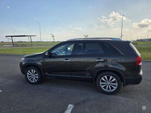 Brown Kia Sorento 2010 in Marijampole, with an engine capacity of 2.20 L and mileage of 265 thousand km for 4400 €, photo 10 on AUTOMOTO.COM.LV