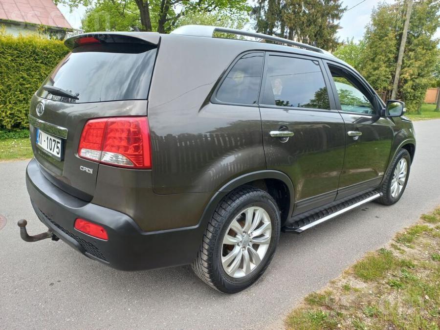Brown Kia Sorento 2012 in Riga, with an engine capacity of 2.20 L and mileage of 280 thousand km for 2900 €, photo 6 on AUTOMOTO.COM.LV