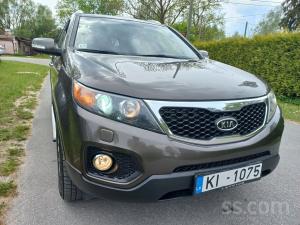 Brown Kia Sorento 2012 in Riga, with an engine capacity of 2.20 L and mileage of 280 thousand km for 2900 €, photo 7 on AUTOMOTO.COM.LV